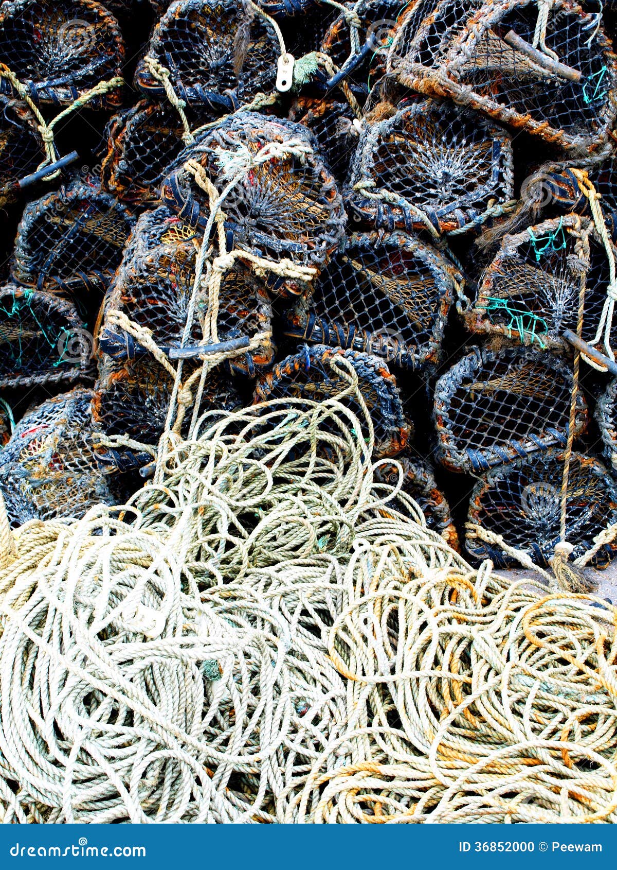 A Pile of Lobster Pots and Rope on the Quayside, Ireland Stock Photo ...