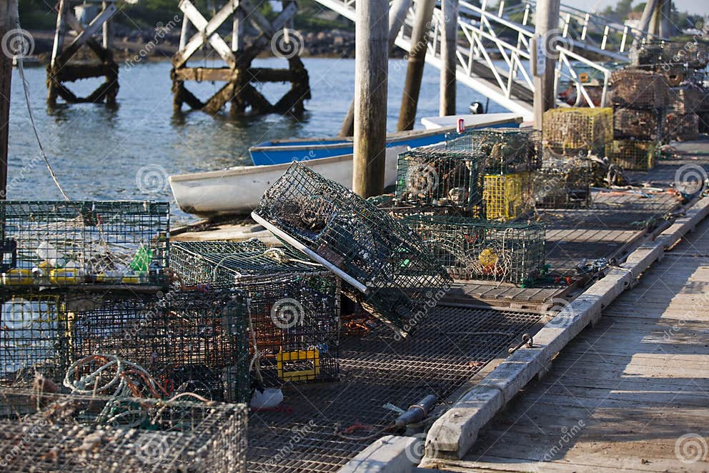 Lobster Traps Stacked on Dock Stock Photo - Image of boats, pots: 22333618