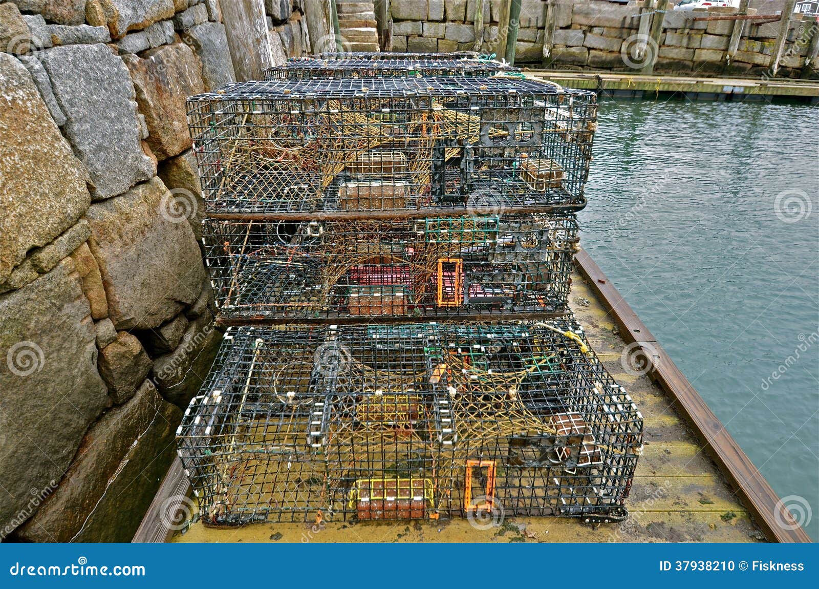 Lobster Traps Stacked on Dock Stock Photo - Image of pilings, retaining ...