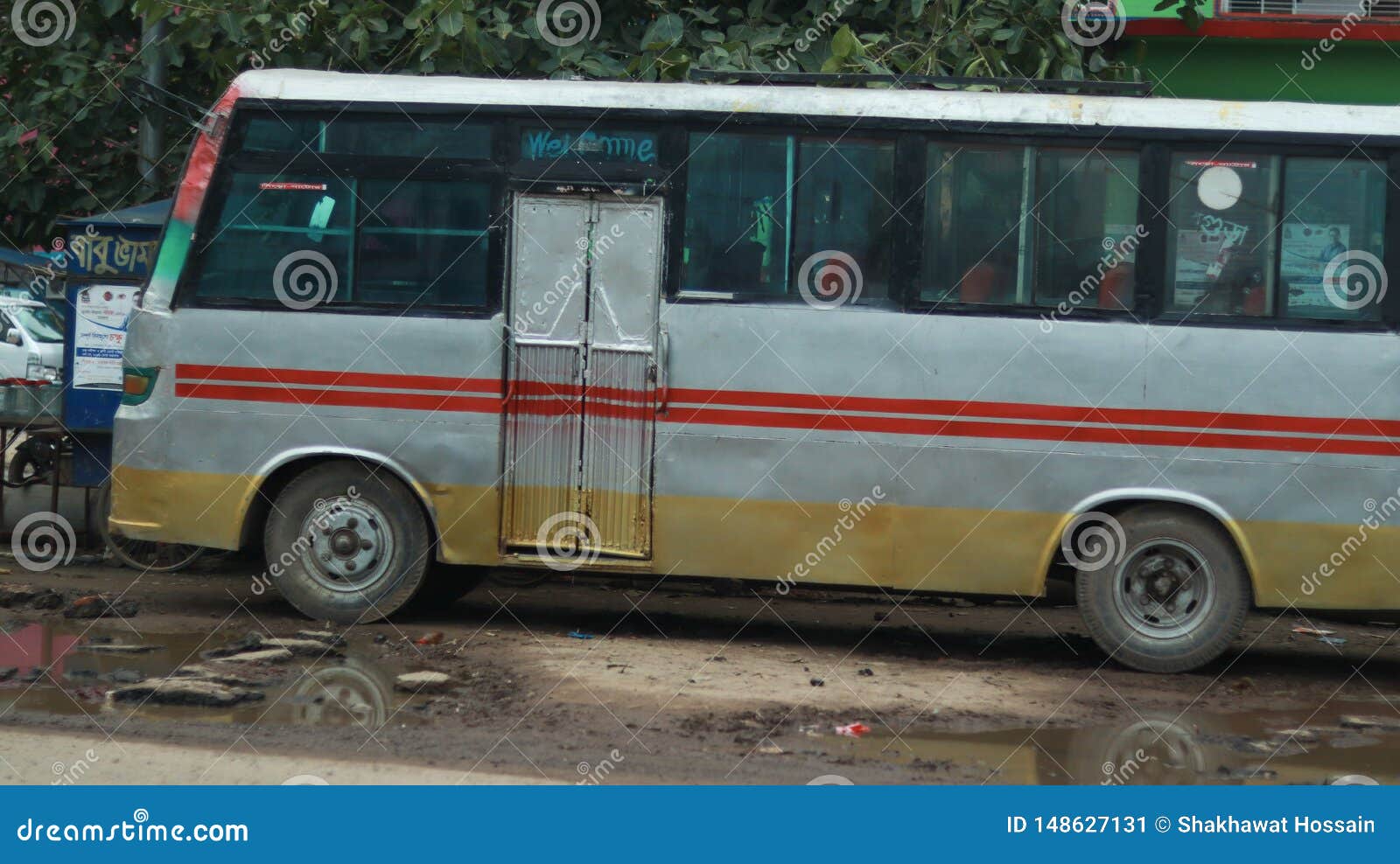 A Local Bus Standing beside the Road. Editorial Photo - Image of indian ...