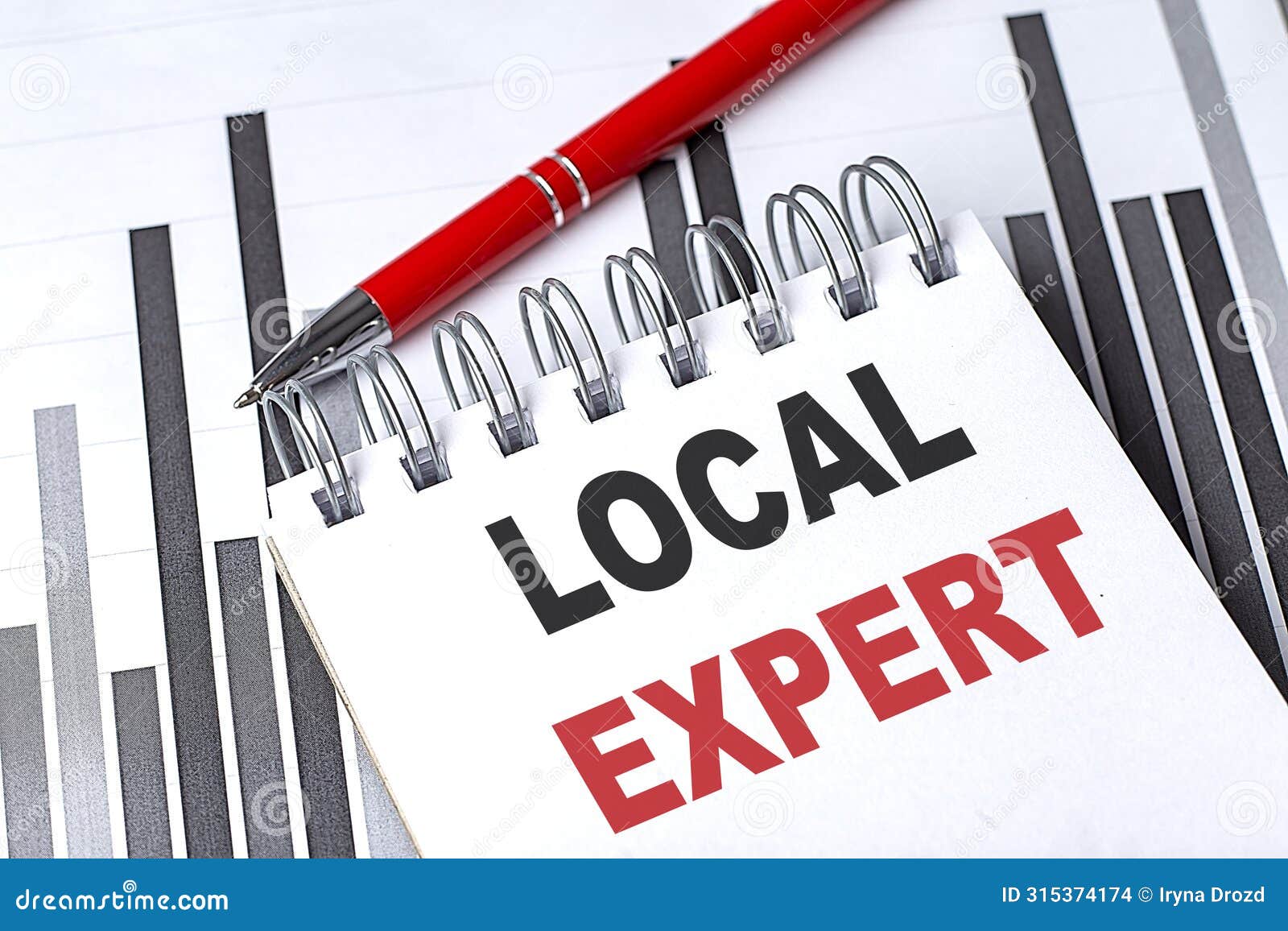 LOCAL EXPERT Text on Notebook on Chart with Pen Stock Photo - Image of ...
