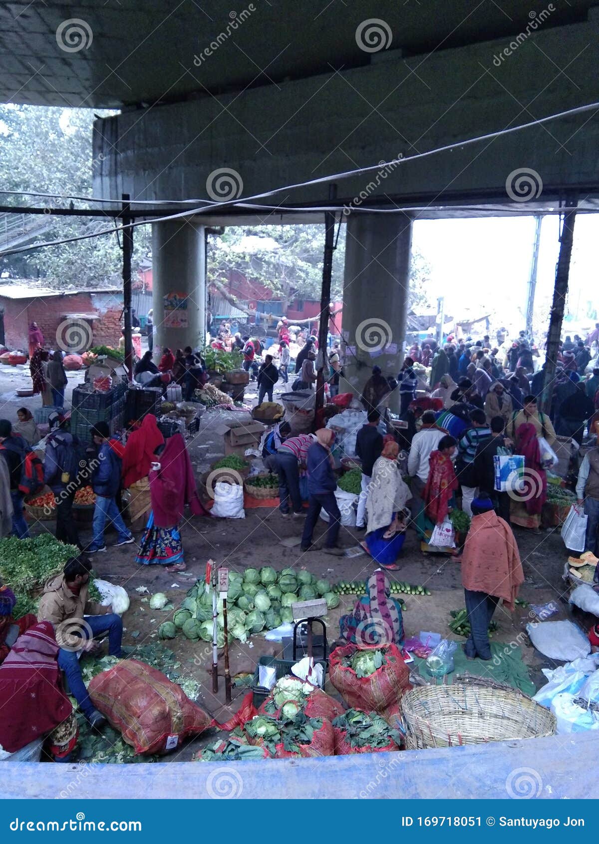 Local Indian People On A Shopping Street During Heavy Rain In ...