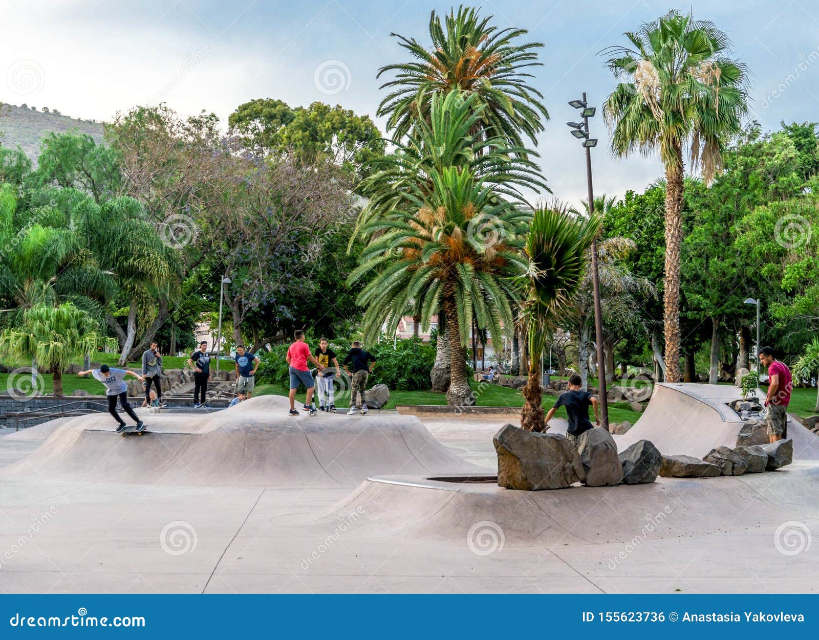 Local Kids Enjoy Riding Skateboards and Scooters in a Skate Park in La ... Local Kids Enjoy Riding Skateboards and Scooters in a Skate Park in La ...