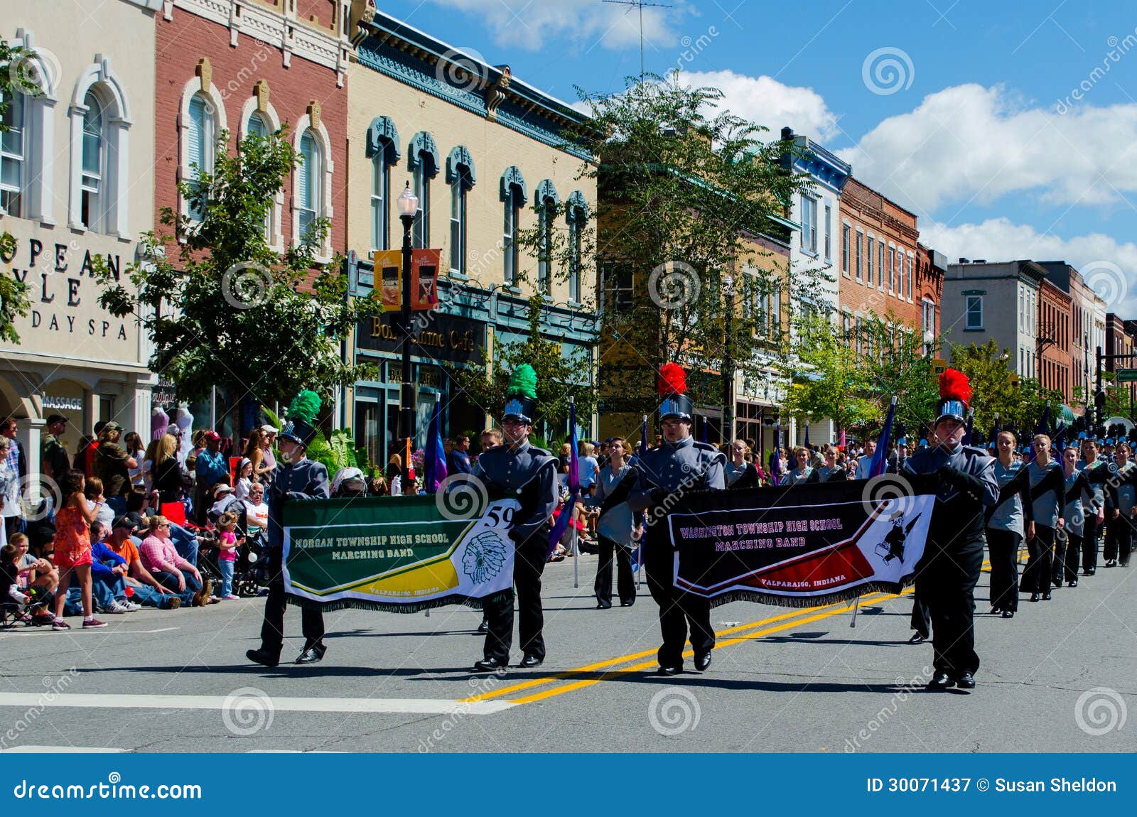 Marching band in a parade editorial photography. Image of instruments ...