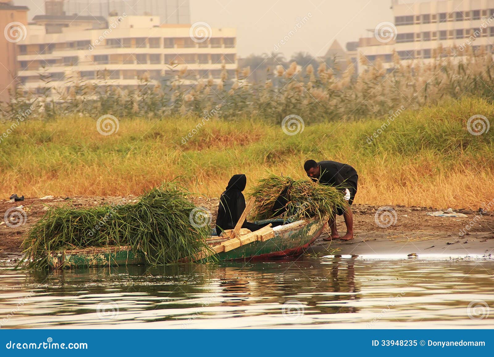 Local People Getting into Boat on the Nile River, Luxor Editorial Image ...