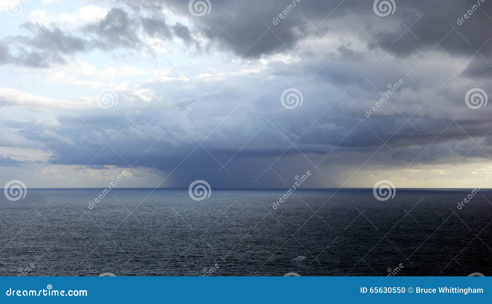 Localised Rain Storm Over Ocean Stock Photo - Image of clouds ...