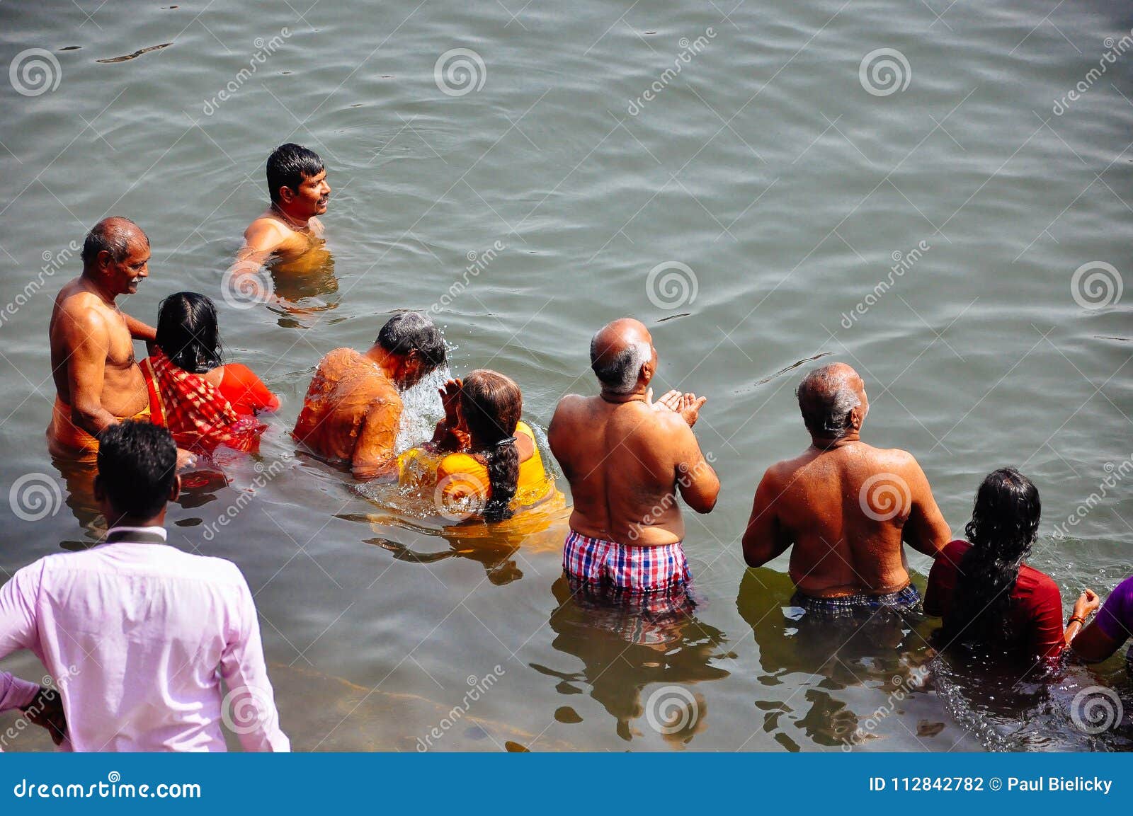Locals Dip in the Ganges River in Varanasi, India. Editorial ...