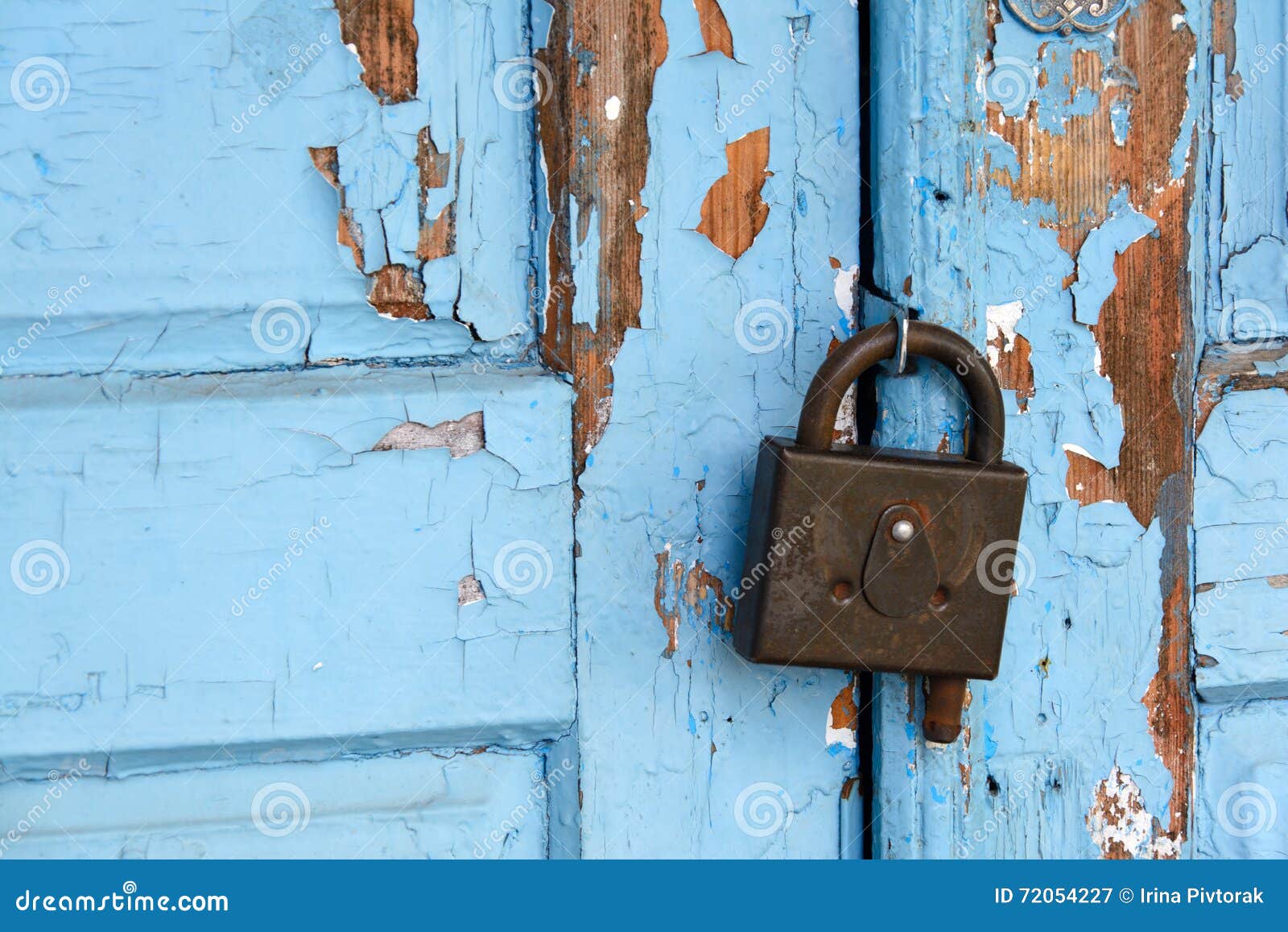 Lock on the blue door stock image. Image of lock, double - 72054227