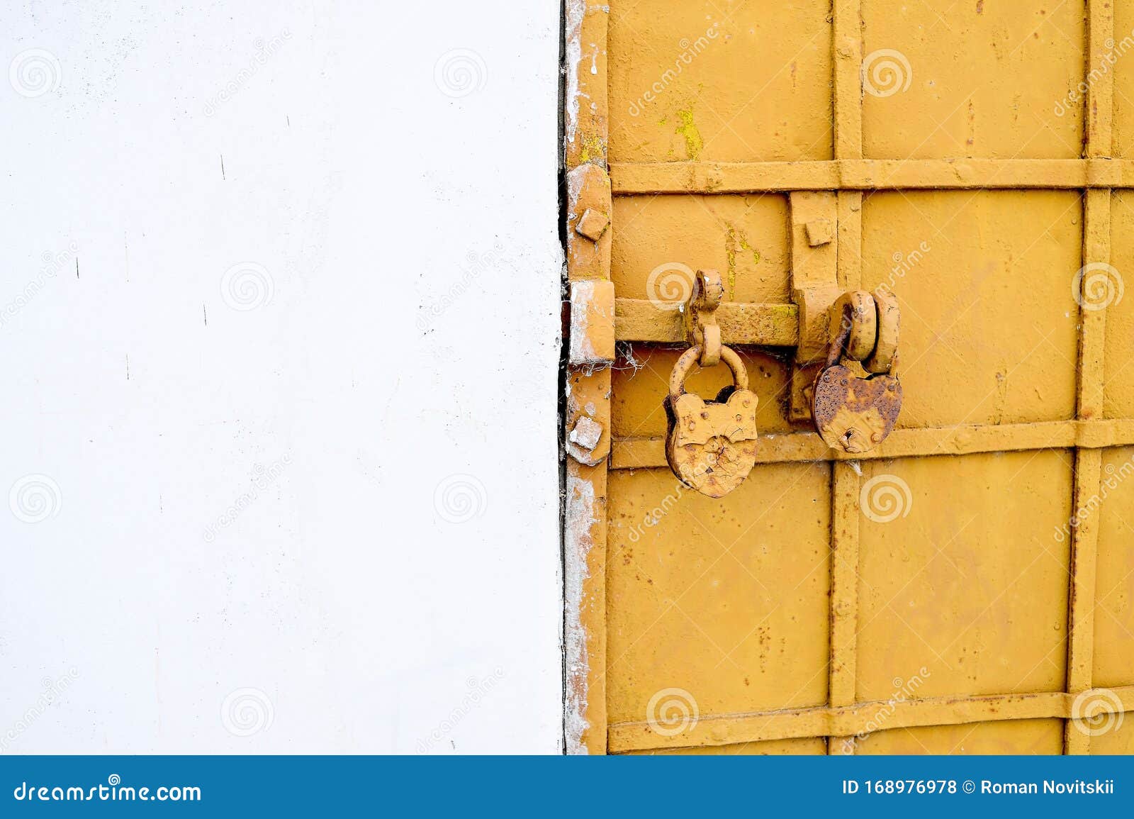Lock with the Bolt Closed on the Background of the Antique-bound Door ...