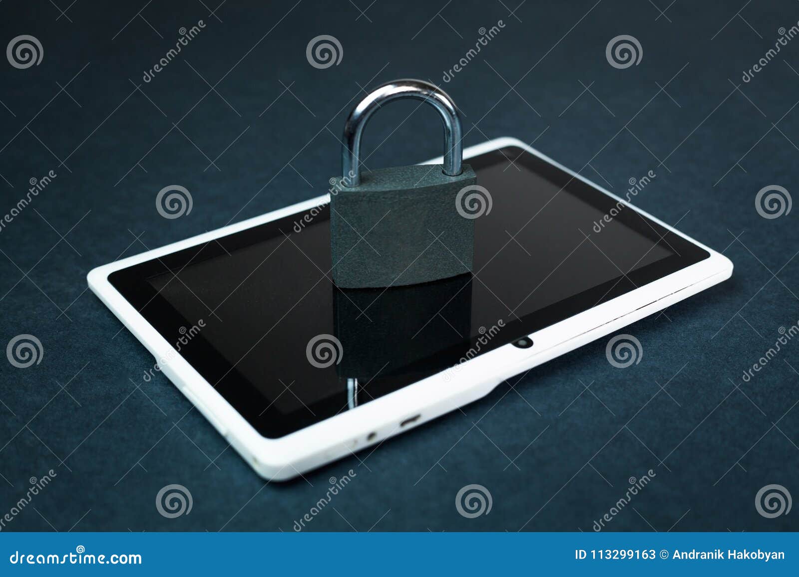 Lock on a digital tablet. stock image. Image of access - 113299163