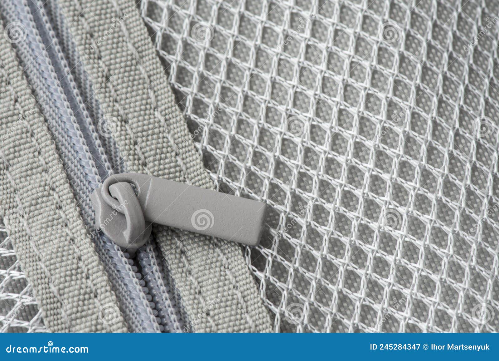 Lock Fastener and Zip Runner Known As Accessories. Abstract Textile ...