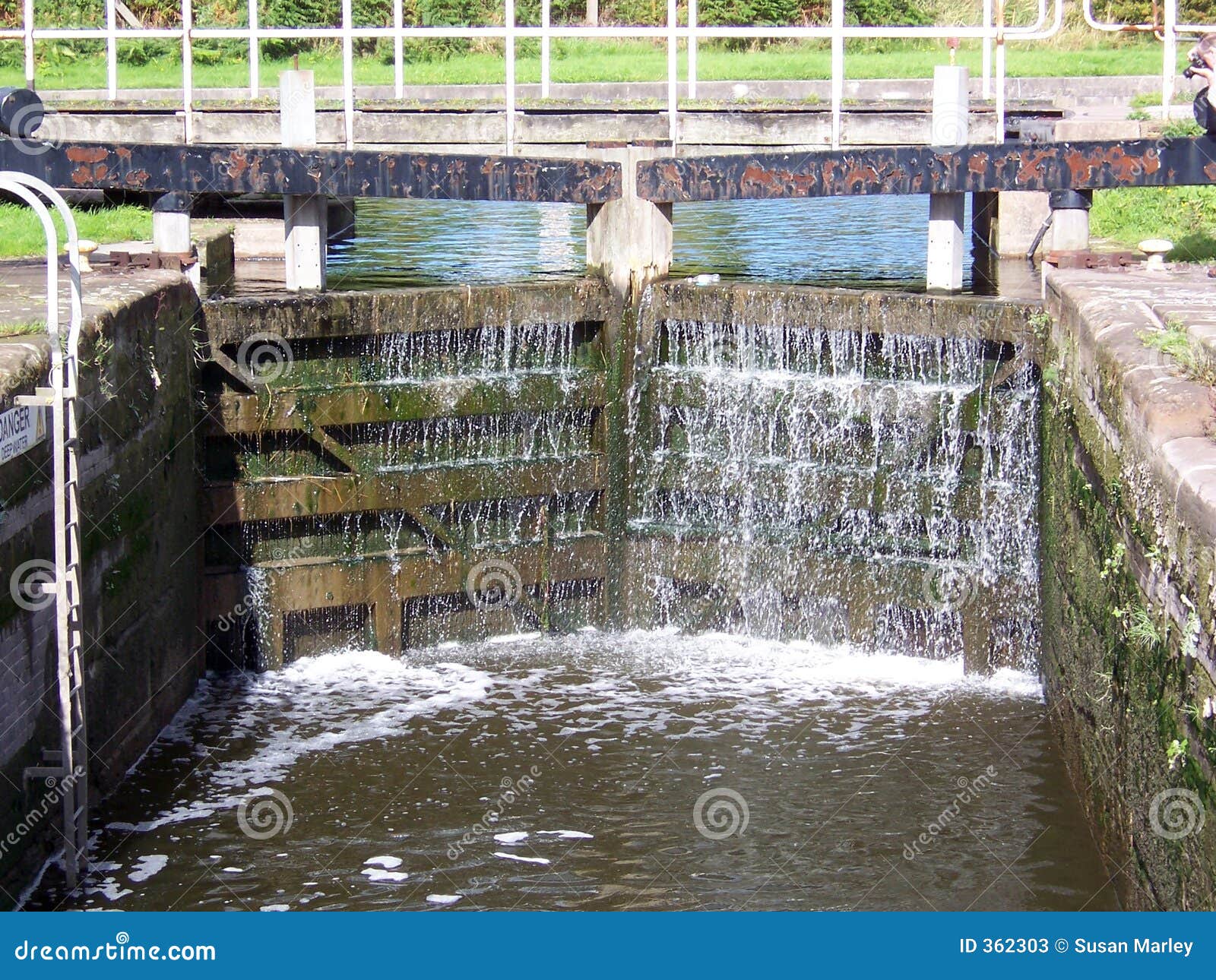 Lock gates 4 stock image. Image of railing, splash, pouring - 362303