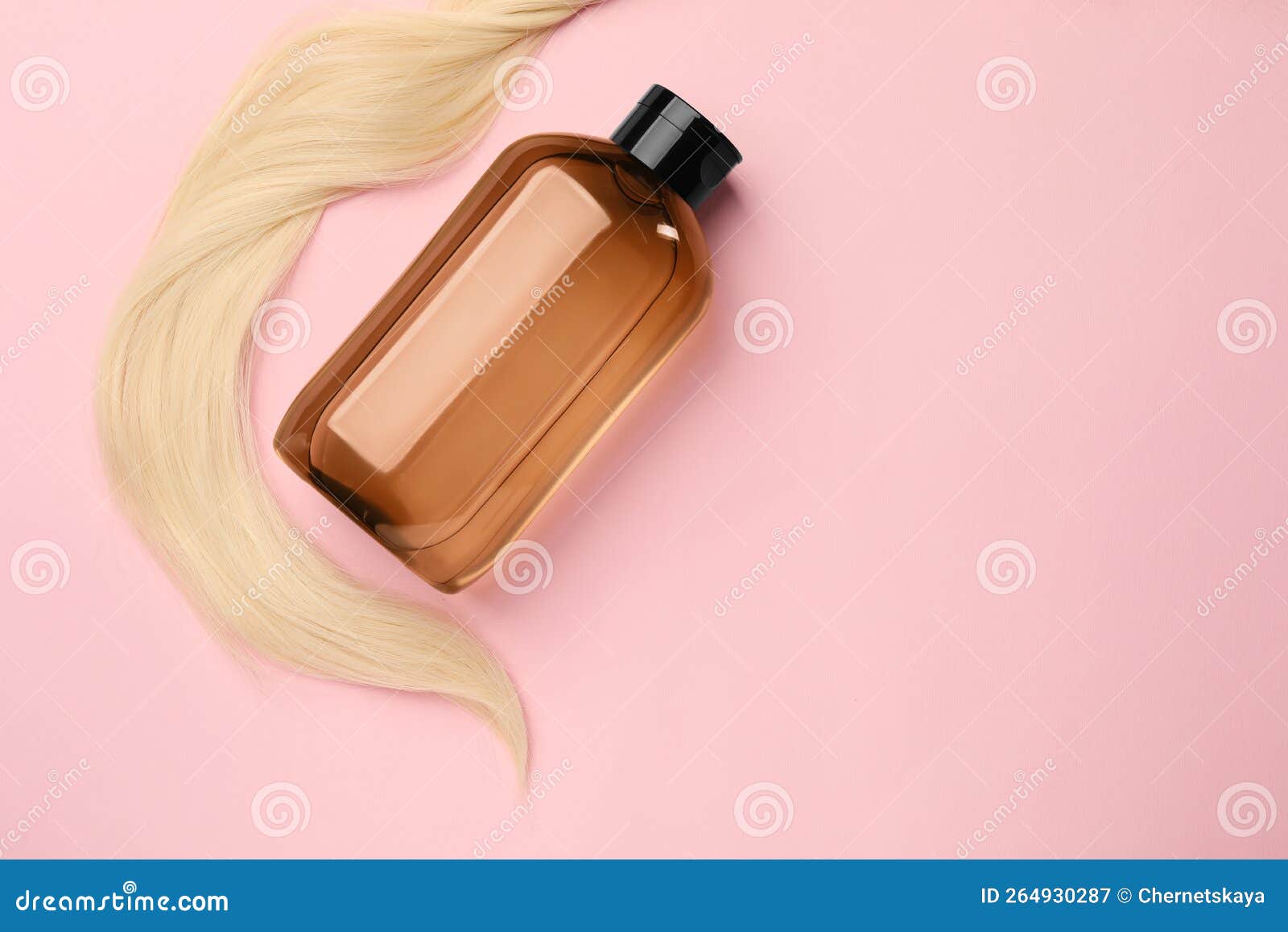 Lock of Hair and Shampoo Bottle on Pink Background, Flat Lay, Space for ...