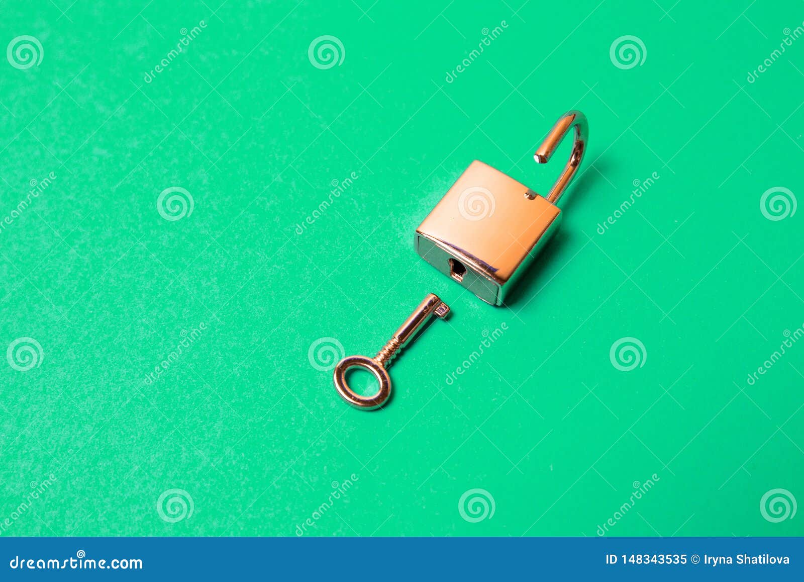 Lock and Key on a Green Background Stock Image - Image of object ...