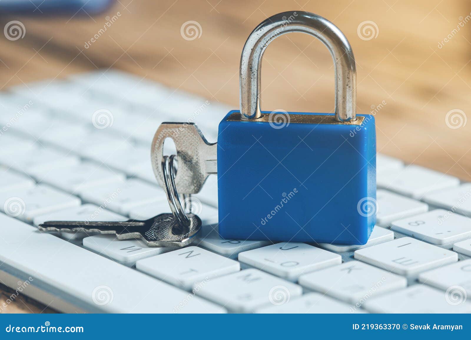 Lock and Key on Keyboard on Desk. Stock Photo - Image of computer ...