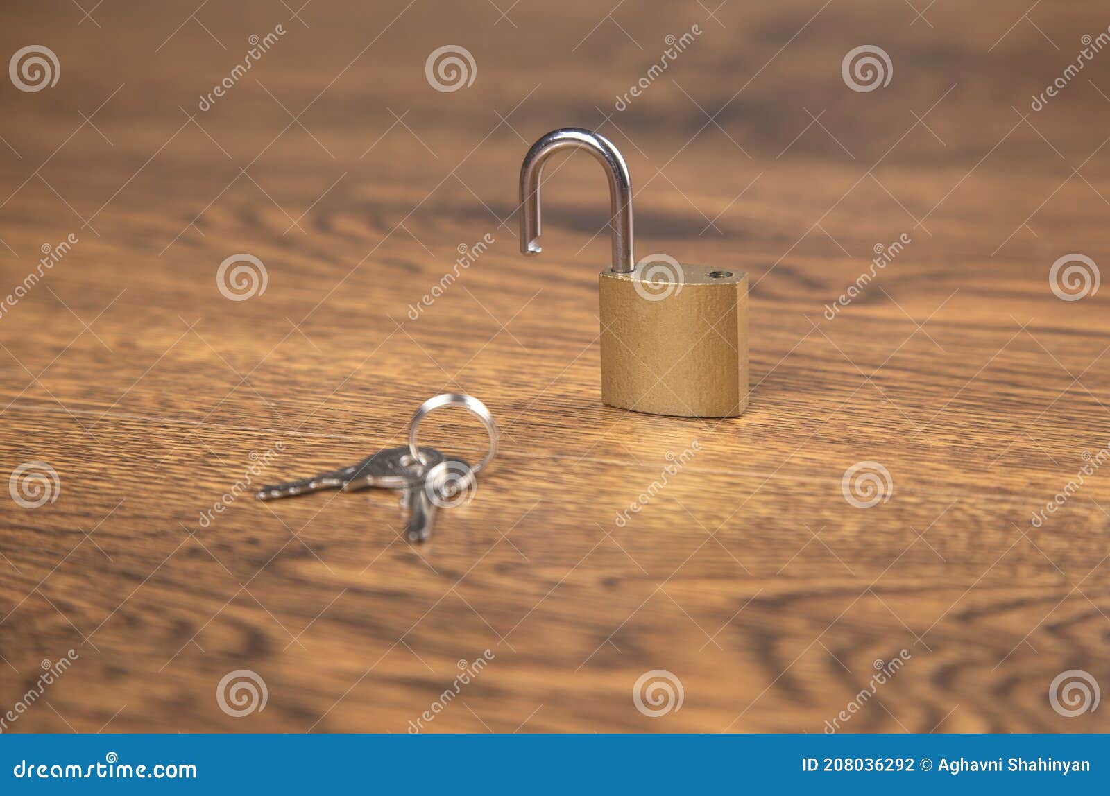 Lock with key on the table stock photo. Image of table - 208036292