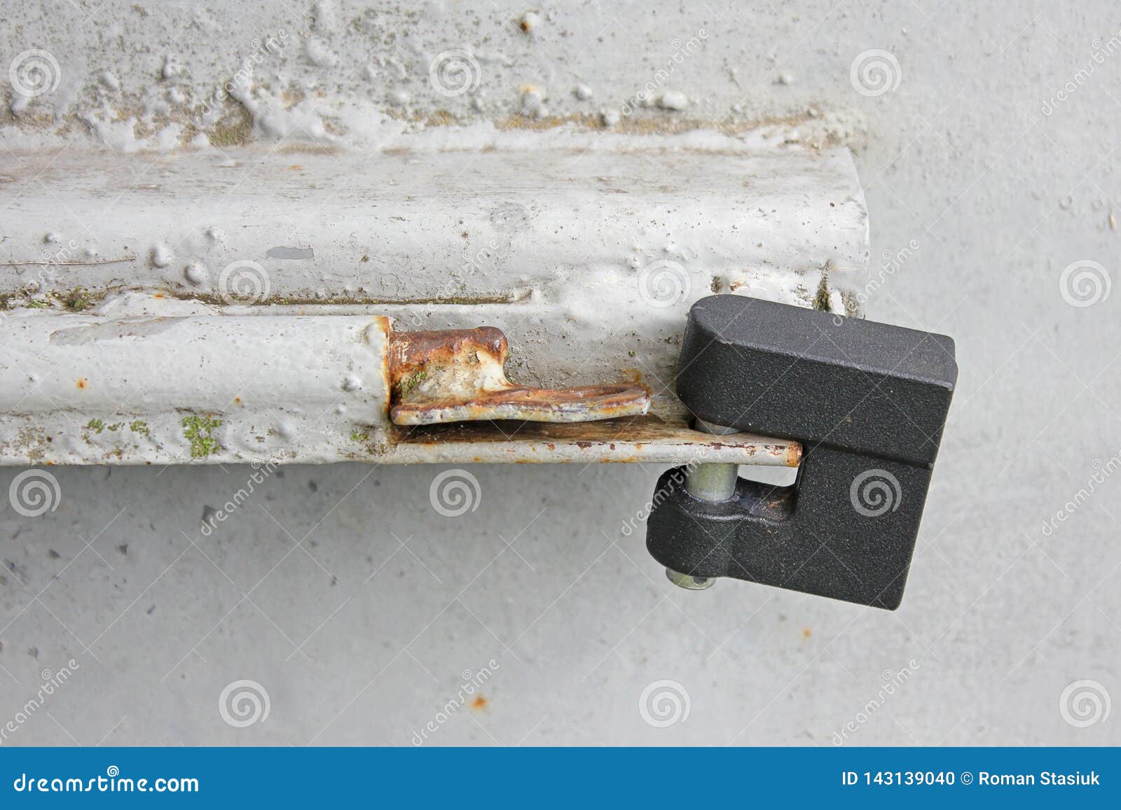 Lock on the metal gate stock photo. Image of design - 143139040