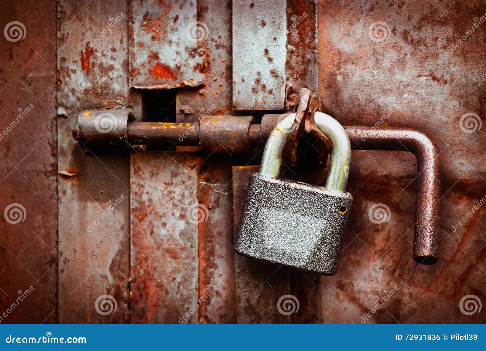 The lock on the old gate stock photo. Image of iron, steel - 72931836