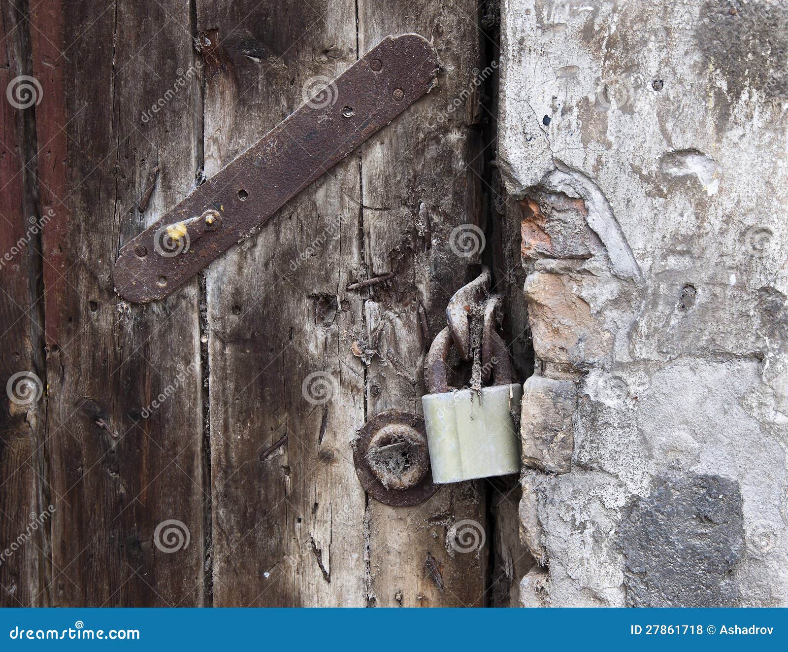Lock on old wooden door stock photo. Image of grunge - 27861718