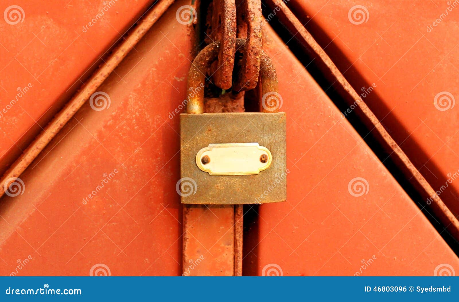 Lock on a rusty iron gate stock photo. Image of rough - 46803096