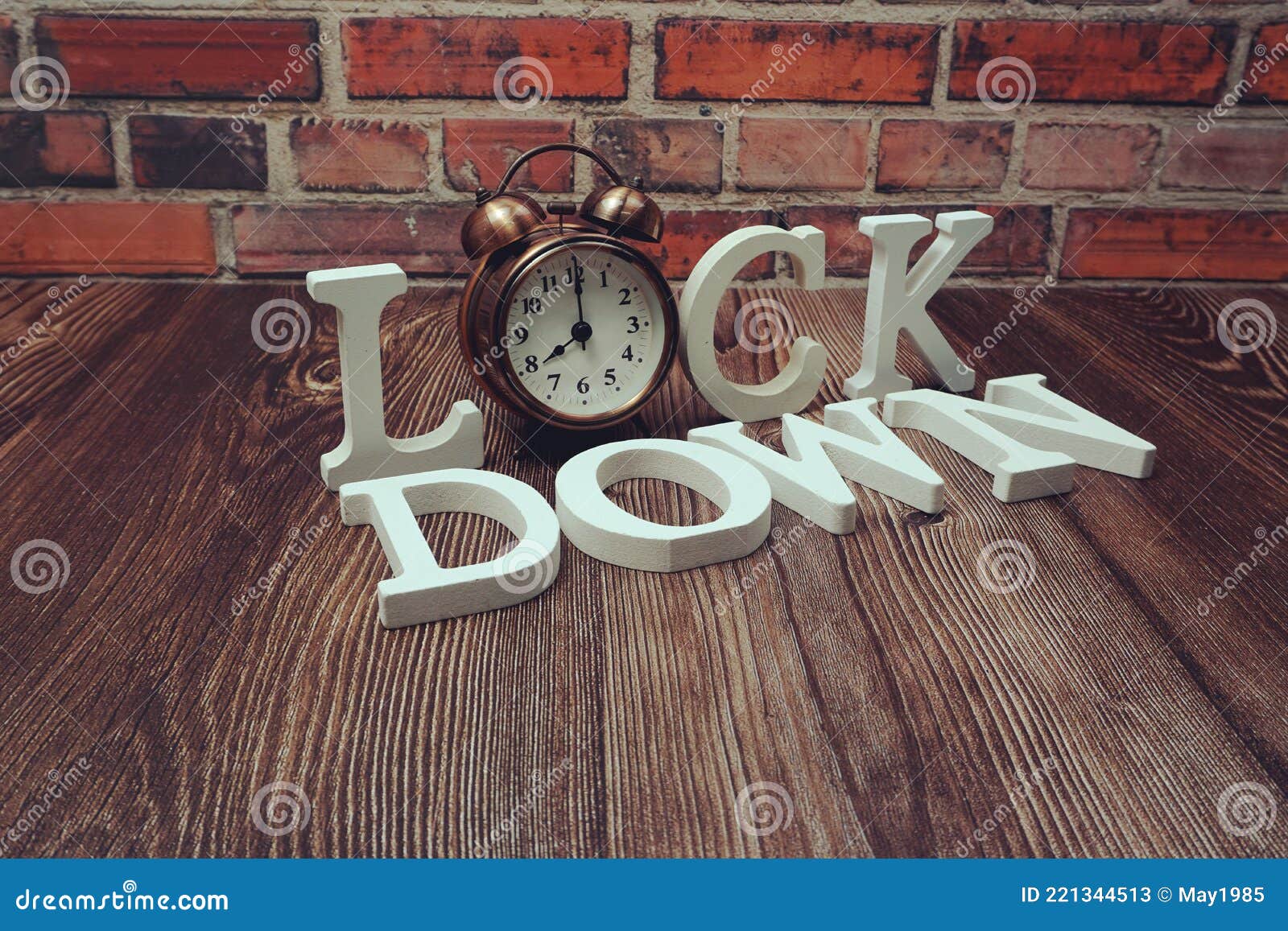 Lock Down Alphabet Letters with Alarm Clock on Wooden Background Stock ...