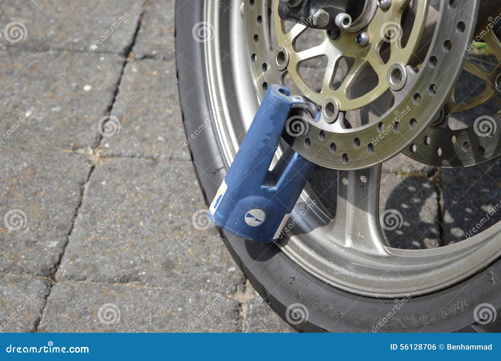 Locked motorbike tire stock photo. Image of motorcycle - 56128706