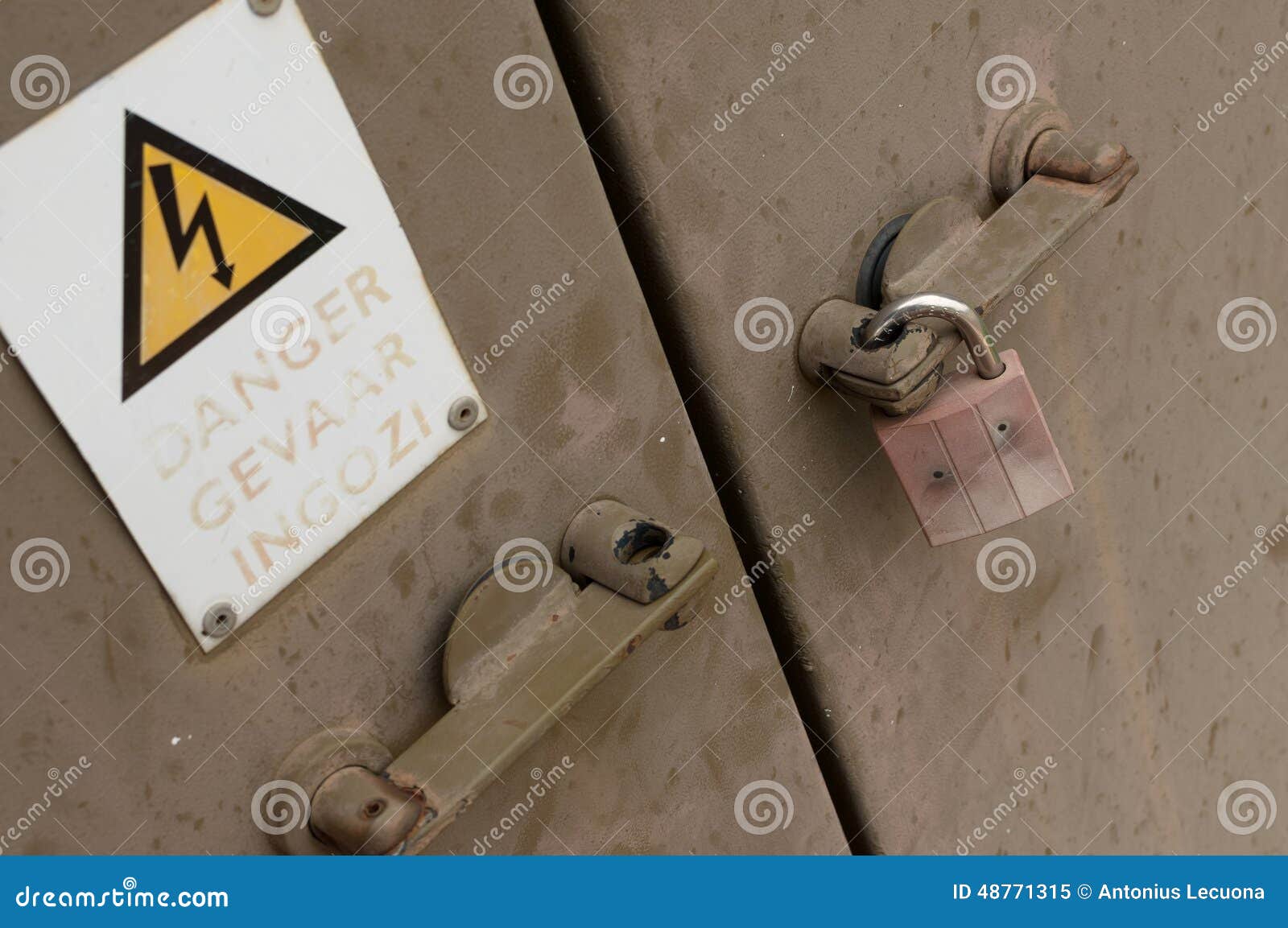 Locked Electrical Panel On The Wall Painted With Yellow Oil Paint ...