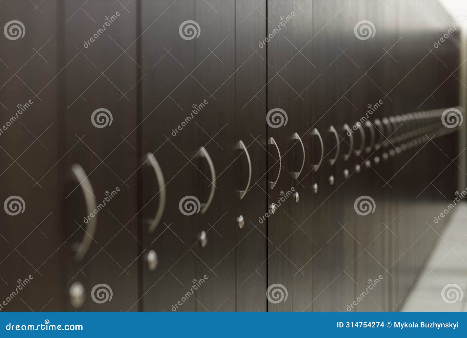 The Lockers in the Locker Room are in a Row of Brown Stock Photo ...