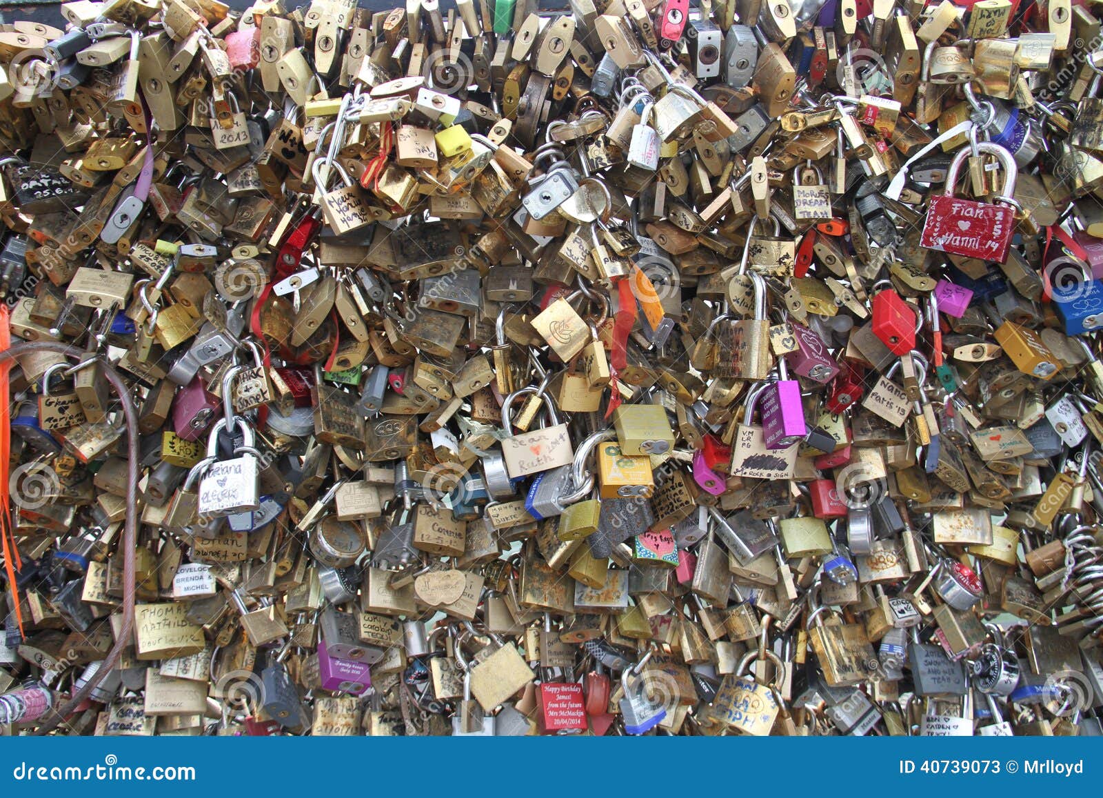 Locks on a bridge in paris editorial stock photo. Image of locks - 40739073