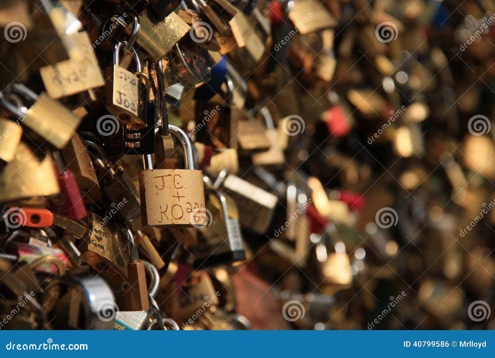 Locks on a bridge in paris stock photo. Image of locks - 40799586