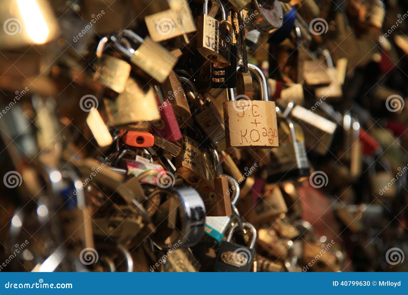 Locks on a bridge in paris stock photo. Image of locks - 40799630