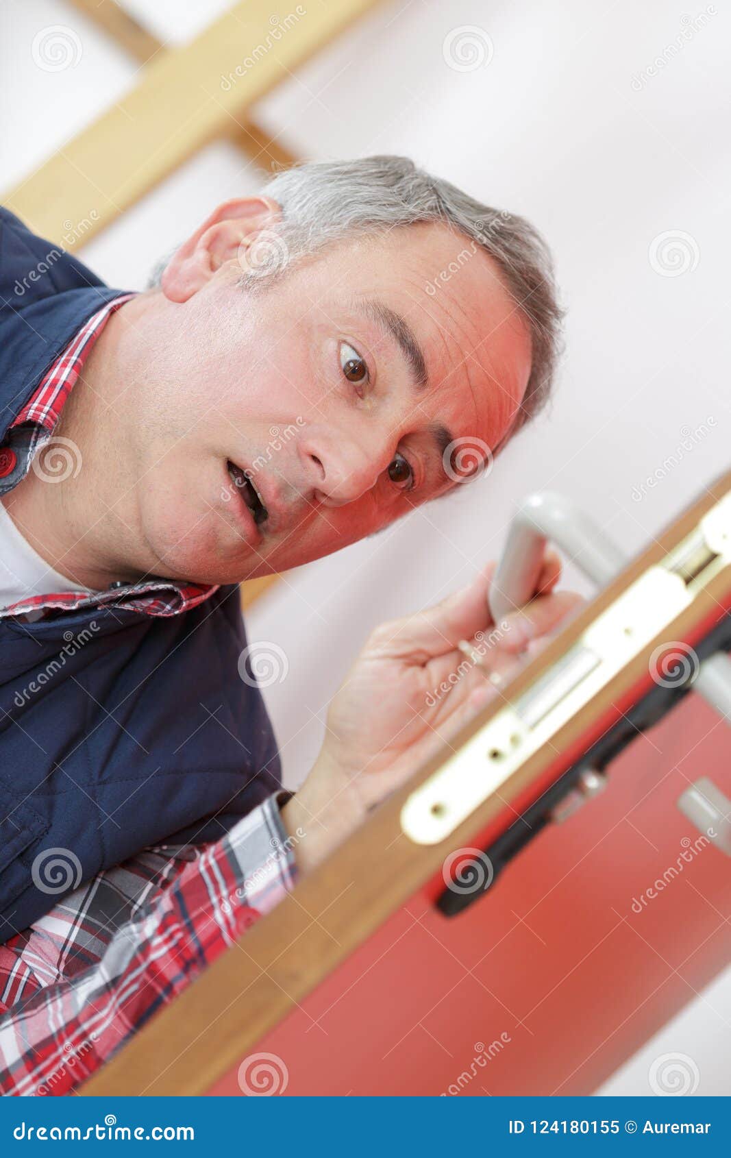 Locksmith Checking Door Lock Stock Image - Image of mature, door: 124180155