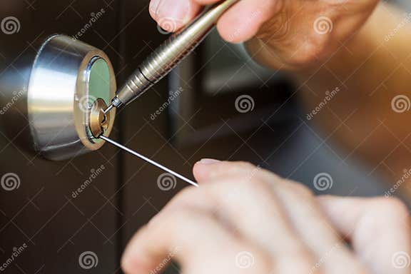 Locksmith Hands Using Pick Tools To Open Locked Door Stock Image ...