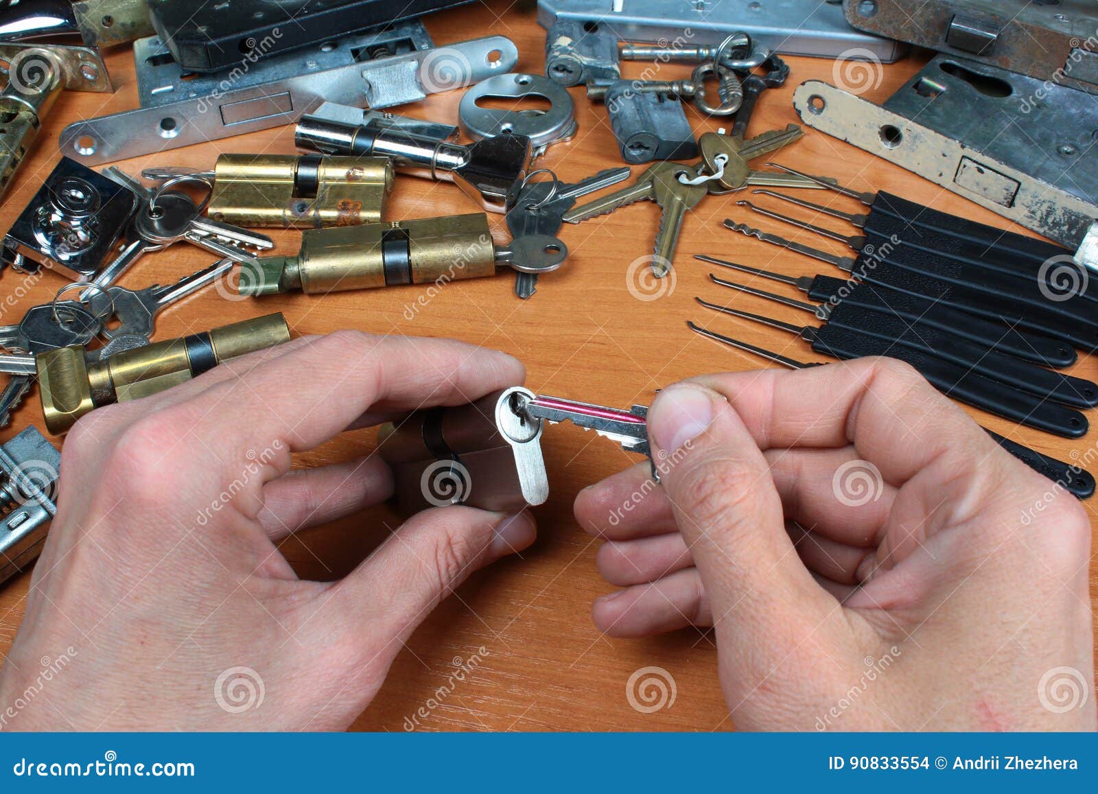 Locksmith Inserts Key in Cylinder Lock Stock Photo - Image of pick ...