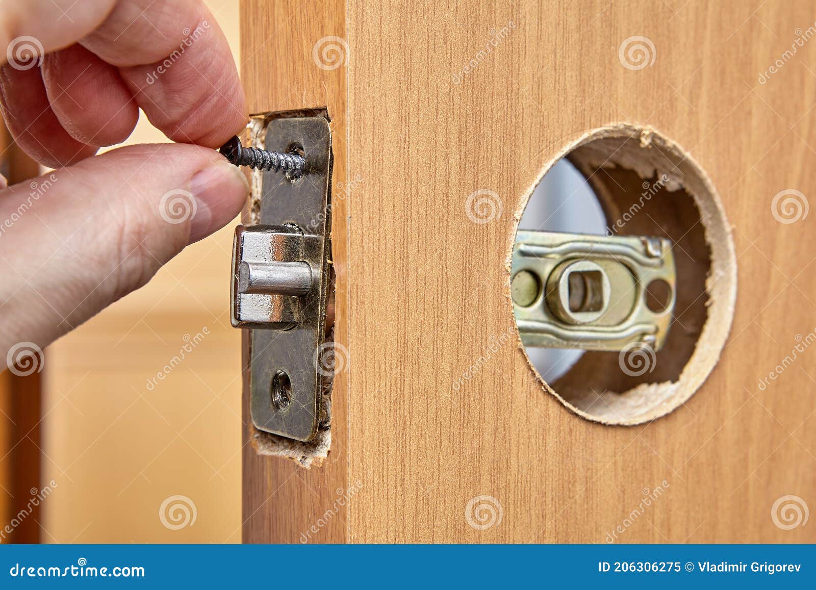 Locksmith Secures the Latch into the Wood Interior Door with 2 Screws ...