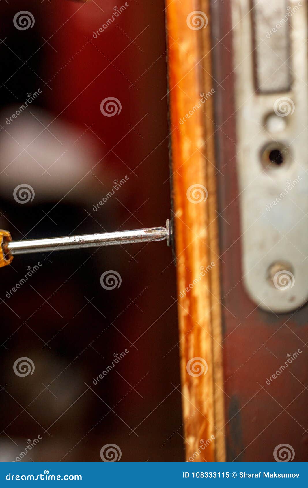 Locksmith Making Installation of Door Lock with Screwdriver. Stock ...