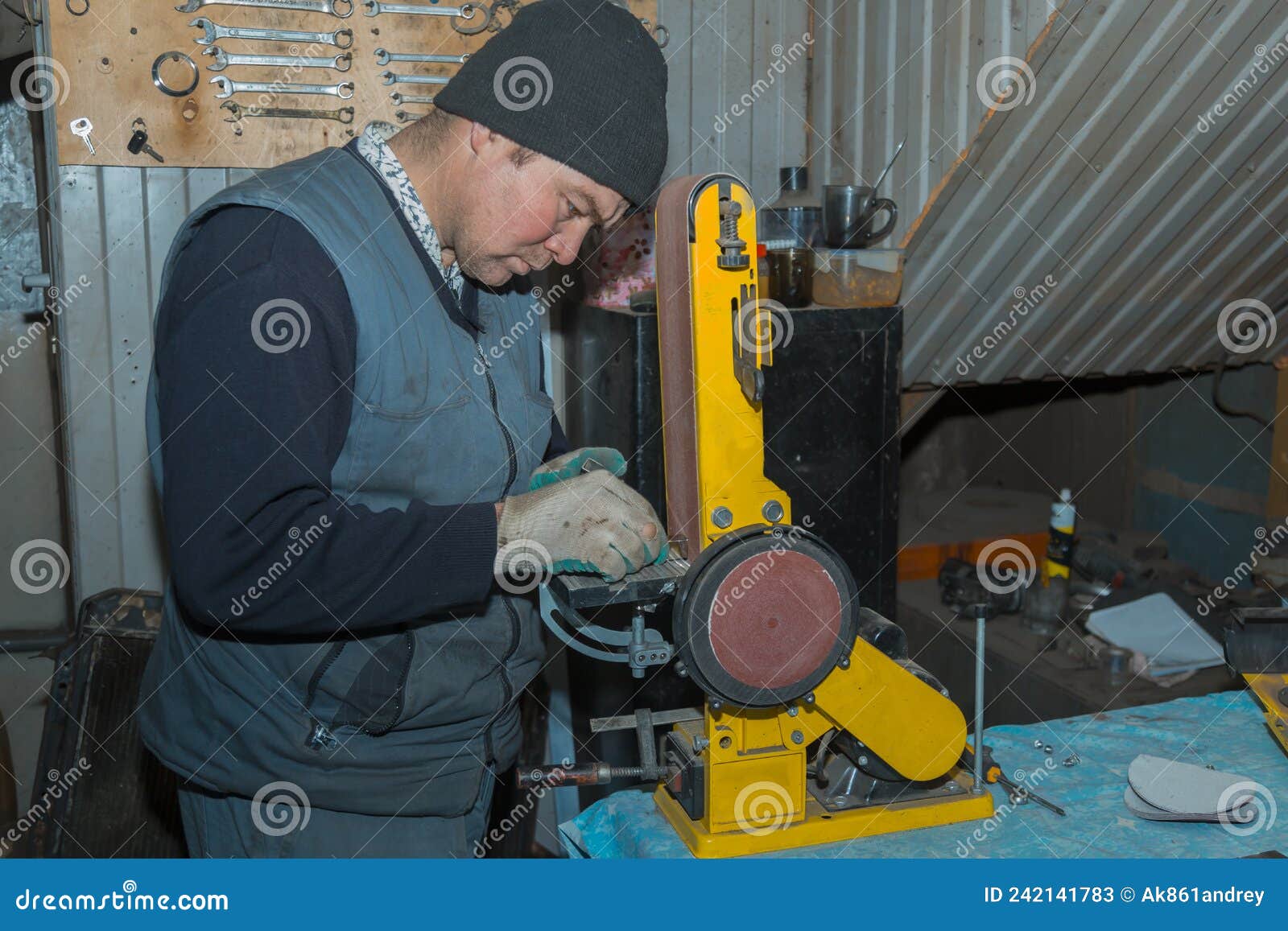 Locksmith Processes The Workpiece Using An Angle Grinder Stock ...