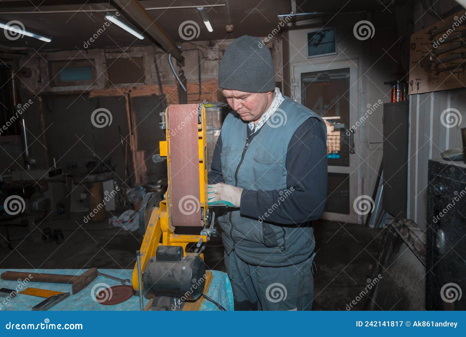 Locksmith Processes a Part on an Emery Machine Stock Image - Image of ...