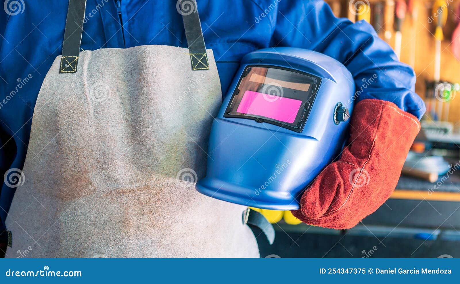 Locksmith in Special Clothes, Helmet and Gloves To Works in Production ...