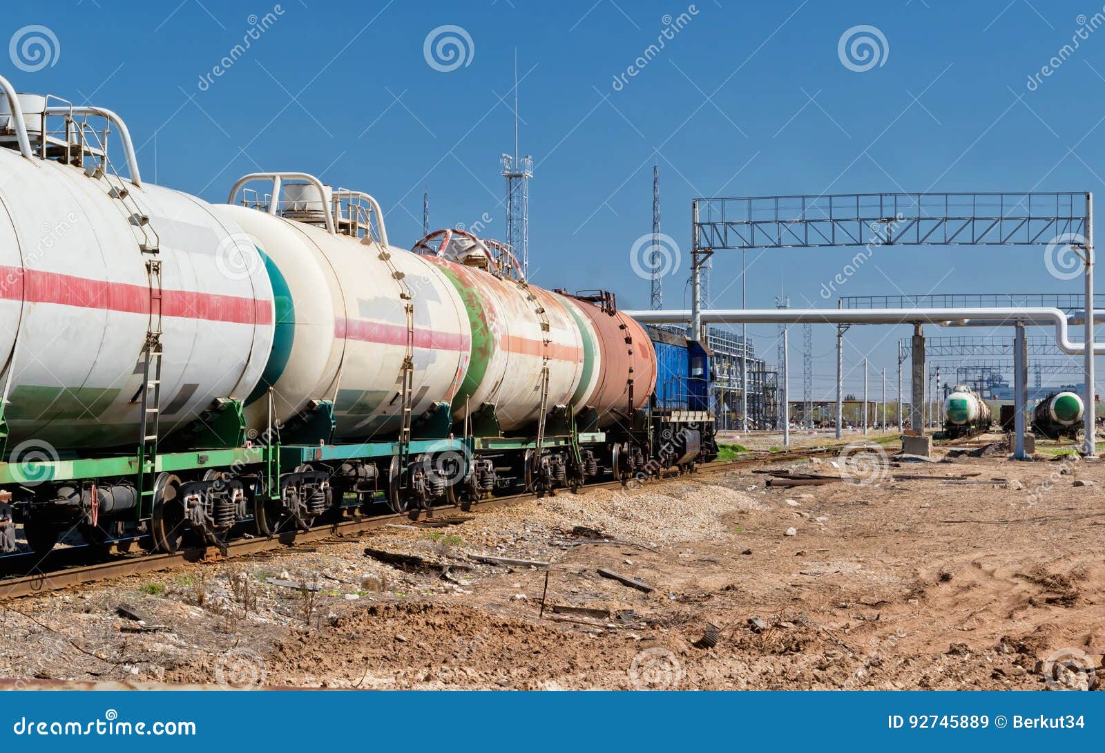 A Locomotive Pulling a Tank of Chemicals on the Rails Stock Image ...