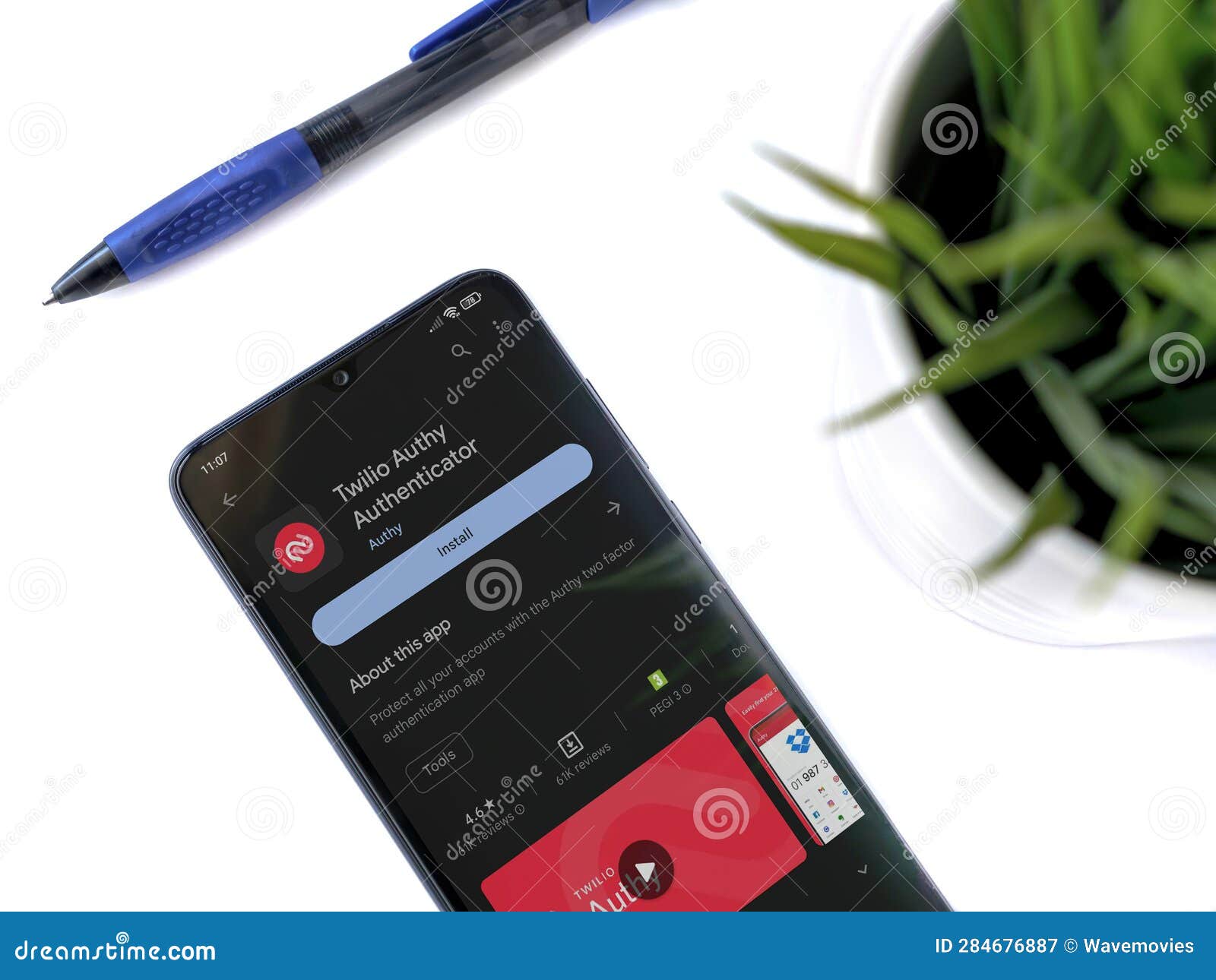 Modern Workspace With Smartphone With Twilio Authy Authenticator App