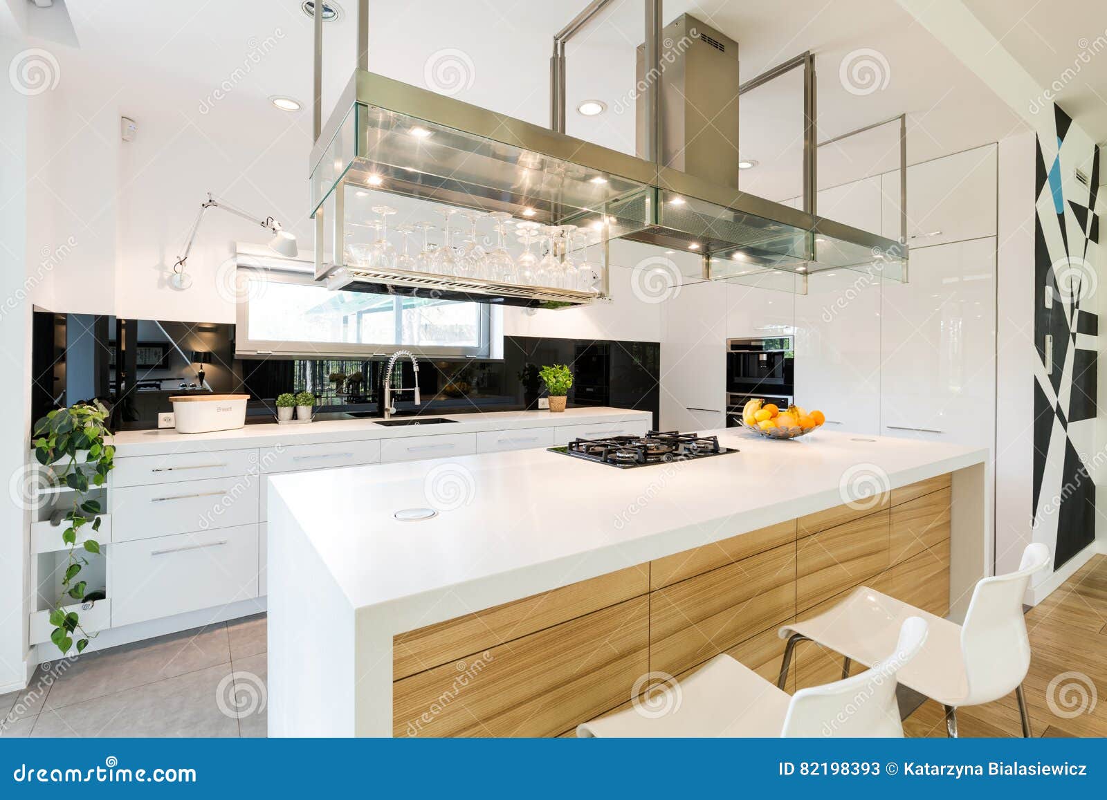 Loft Kitchen Design With Gray Storage Drawers And Integrated Oven ...