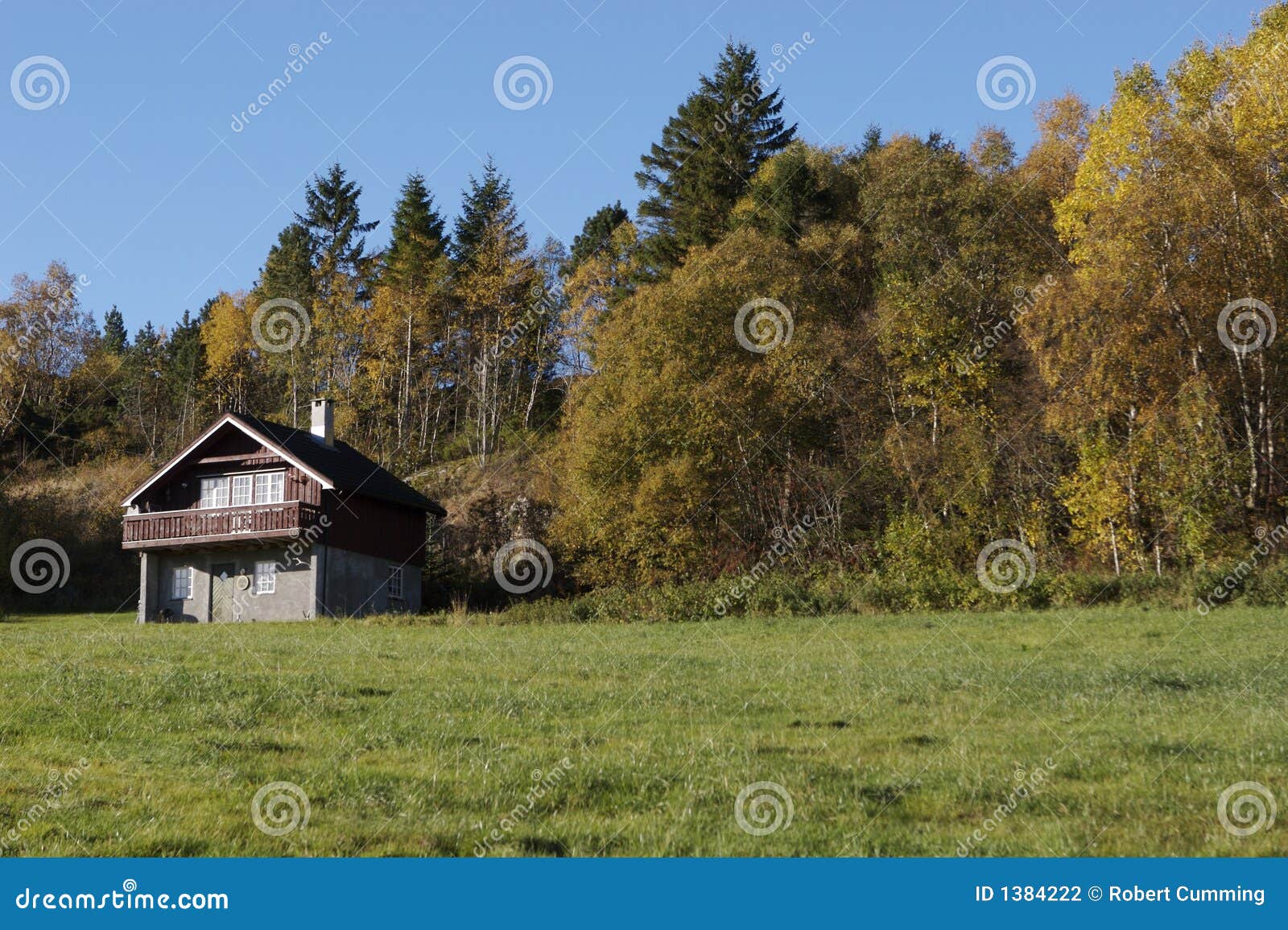Log cabin on hillside stock photo. Image of mountainside - 1384222
