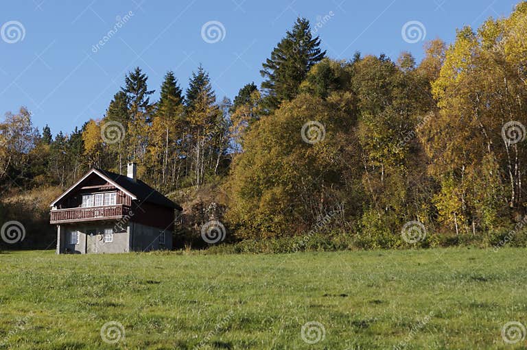 Log cabin on hillside stock photo. Image of mountainside - 1384222