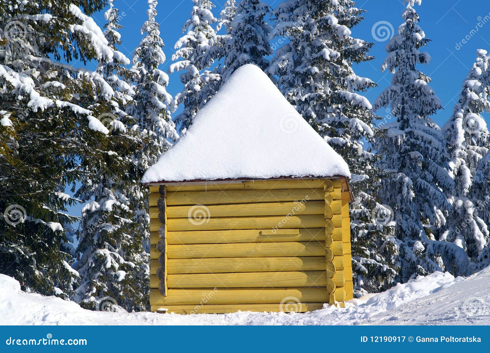 Log cabin in snowy forest stock image. Image of tree - 12190917