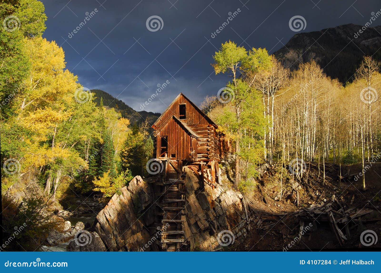 Log cabin in woods stock photo. Image of wooded, forestland - 4107284