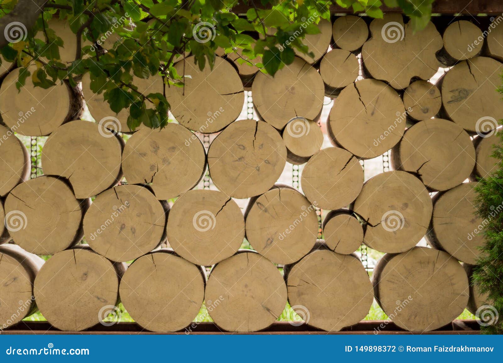 Log fence in the garden stock photo. Image of fence - 149898372