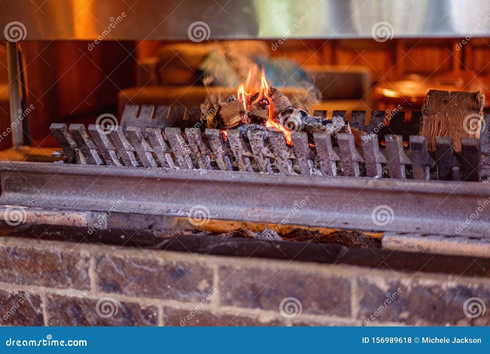 Log Fire in a Brick Fireplace Stock Photo - Image of inside, leisure ...