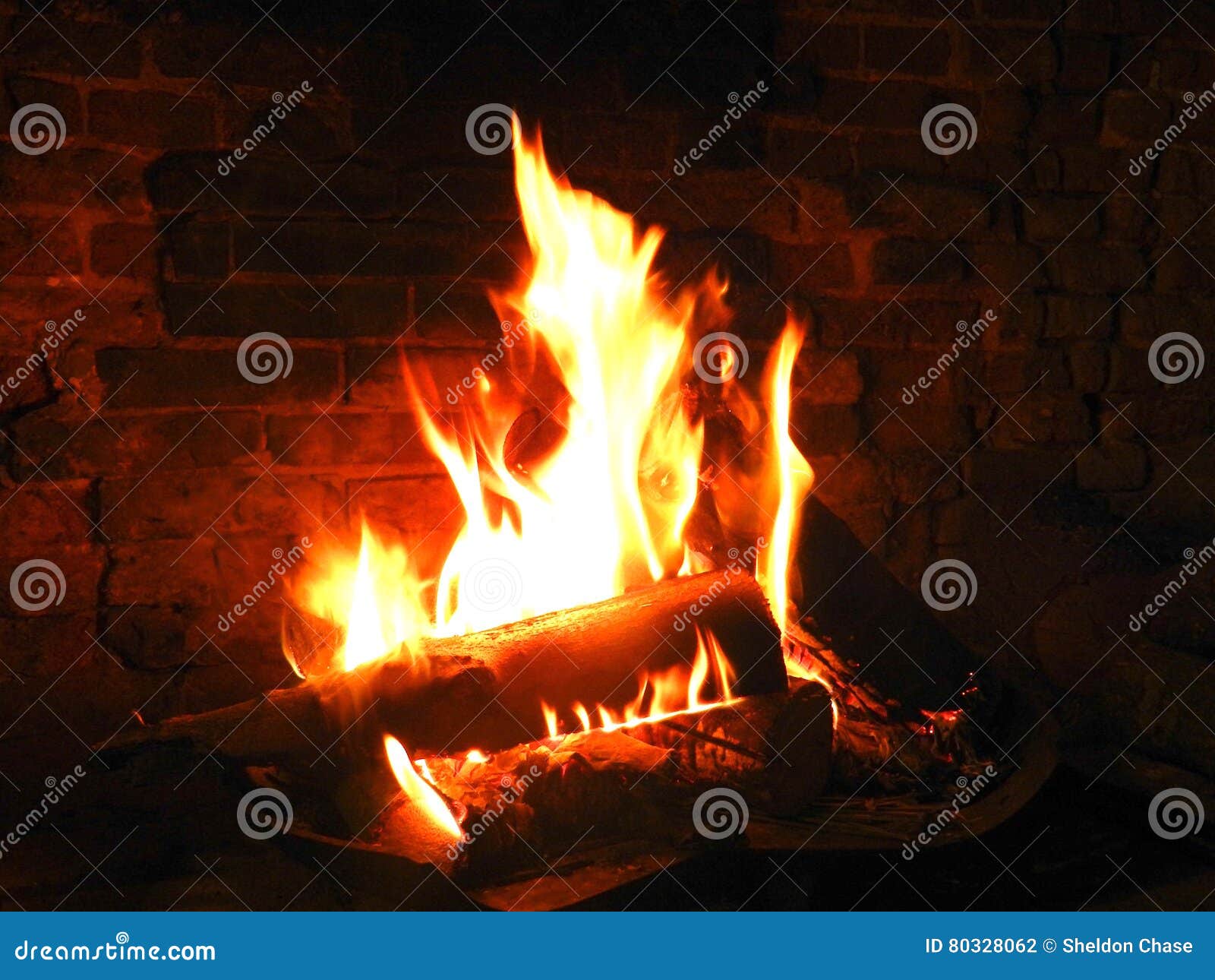Log Fire in Open Brick Fireplace Stock Photo - Image of christmas ...