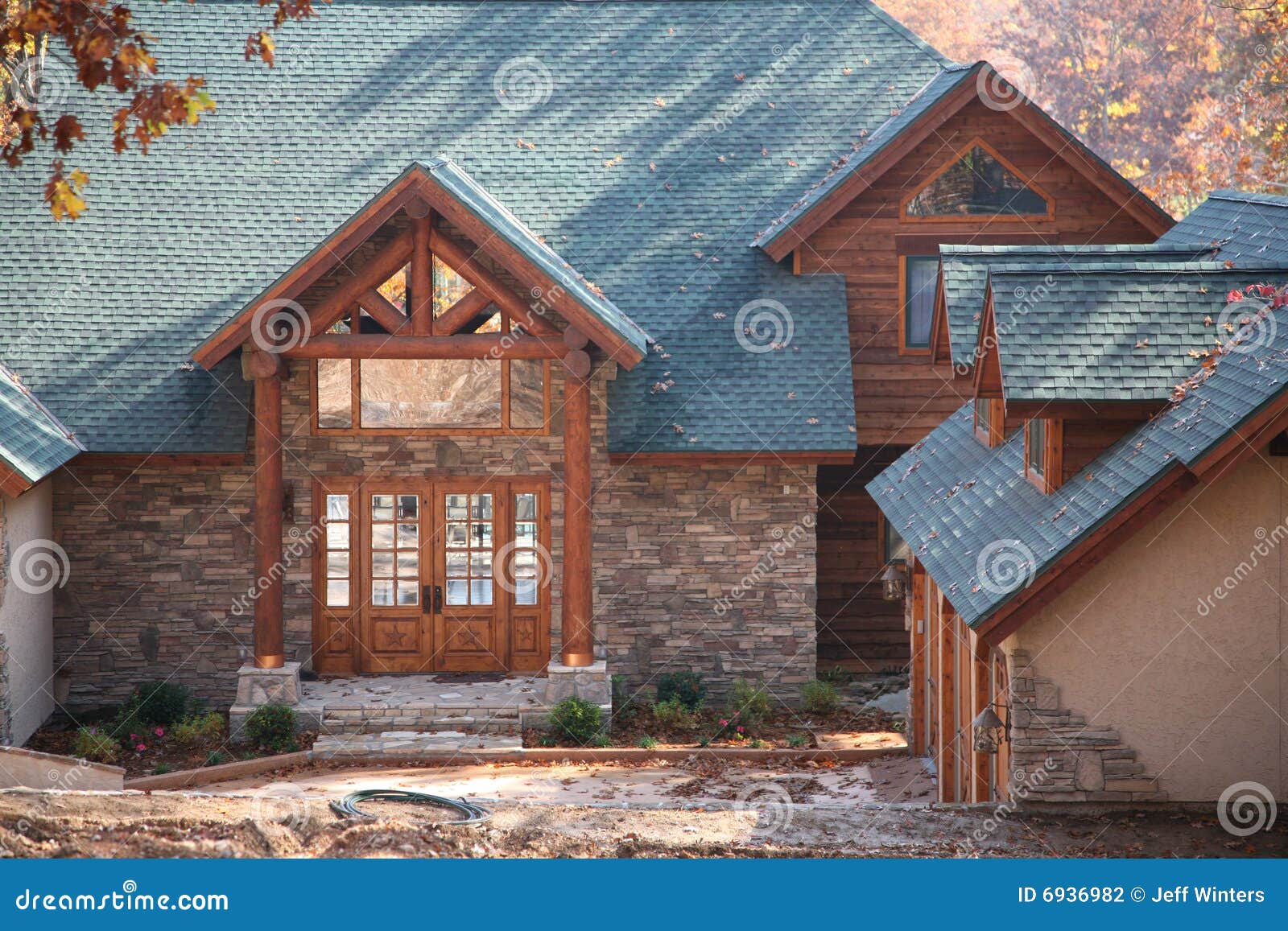 Log home front stock photo. Image of windows, roof, stone - 6936982